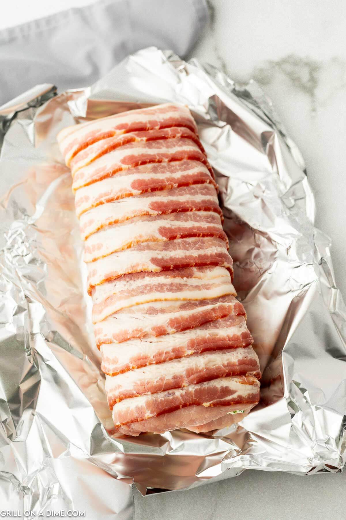 Bacon Wrapped Stuffed Pork Loin Recipe - grillonadime.com